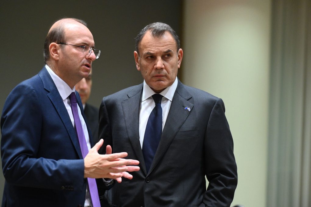 Defence Minister Mr. Nikolaos Panagiotopoulos holds a telephone ...